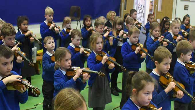 Young musicians from Forest infant school impress with first violin ...